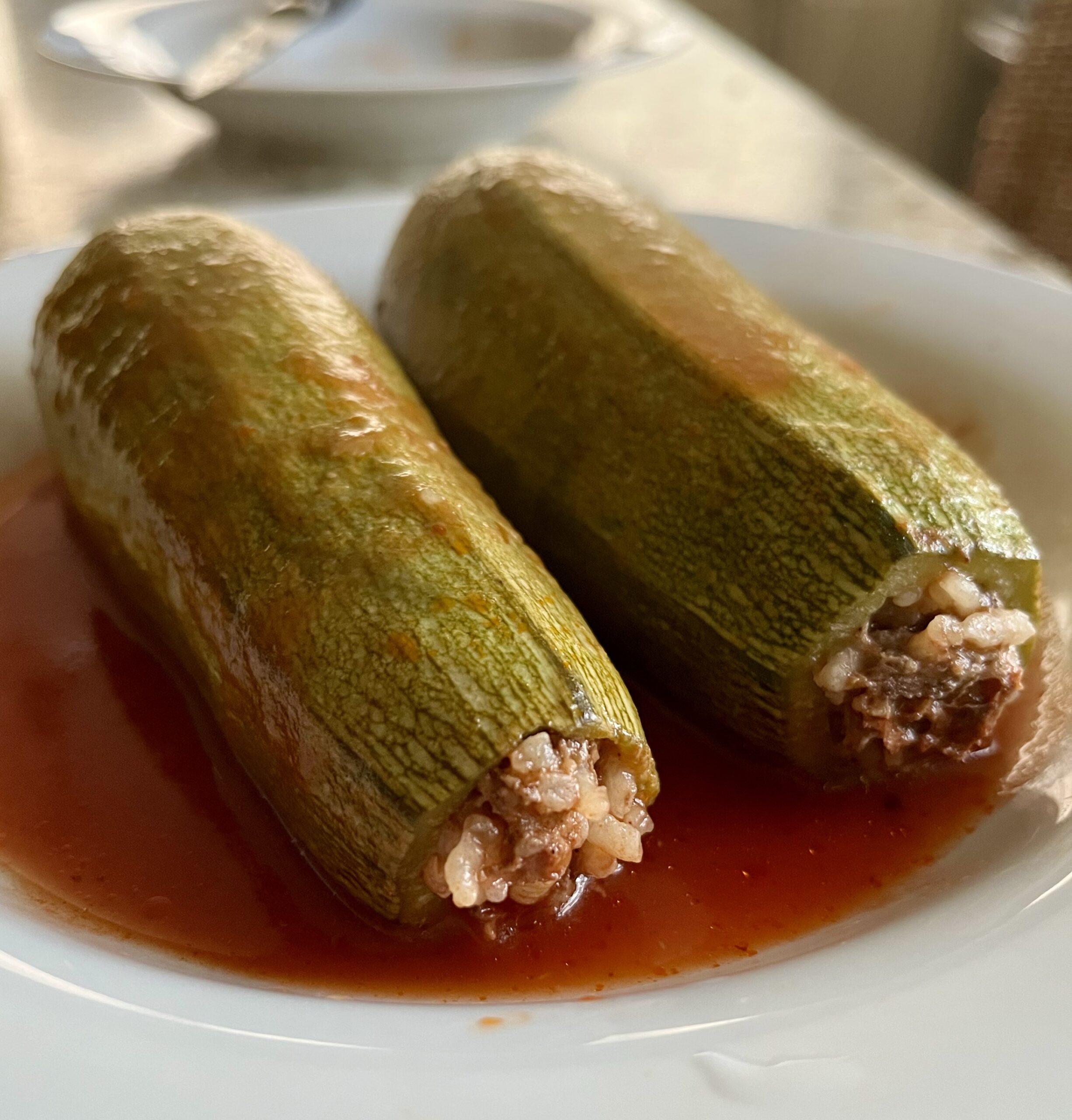 Stuffed Squash in Tomato Sauce (Kousa Mahshi) - Janine's Recipes